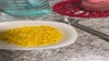 Choice 2 oz. Red Perforated Portion Spoon